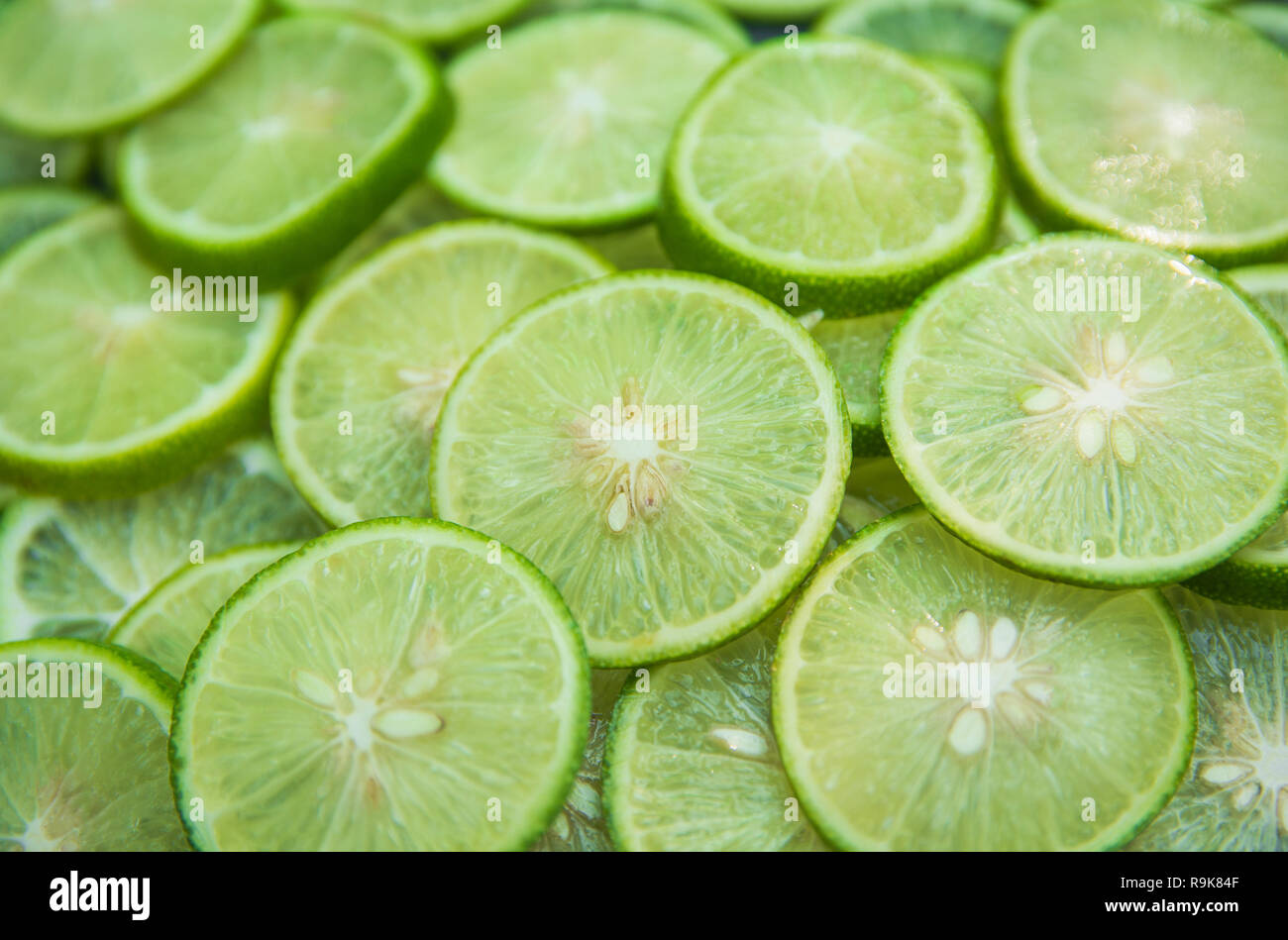 Citrus fruit of lime slices background Stock Photo - Alamy