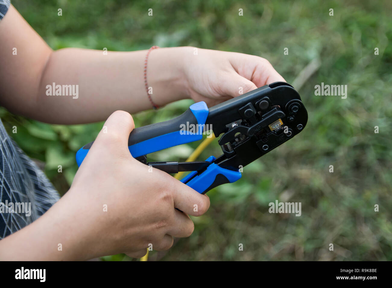 Assembly LAN cable to RJ45 with lan cable clamp Stock Photo - Alamy