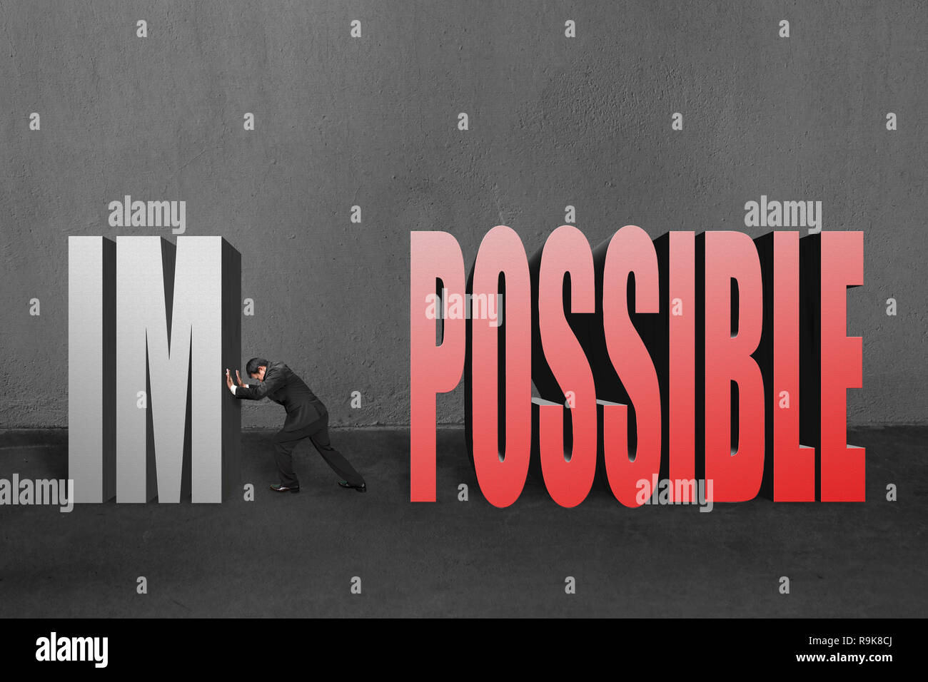 Businessman push word "impossible" im away, to make it possible in ...