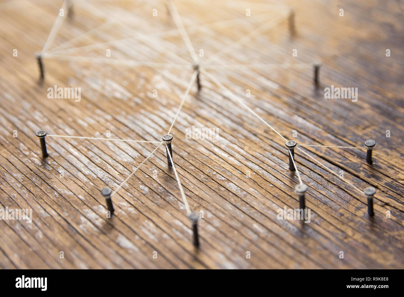 Connecting networks concept - network connected with yarn white on ...