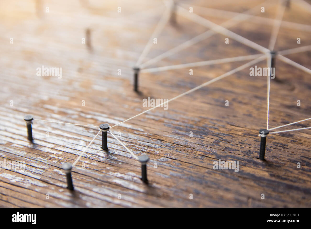 Connecting networks concept - network connected with yarn white on ...