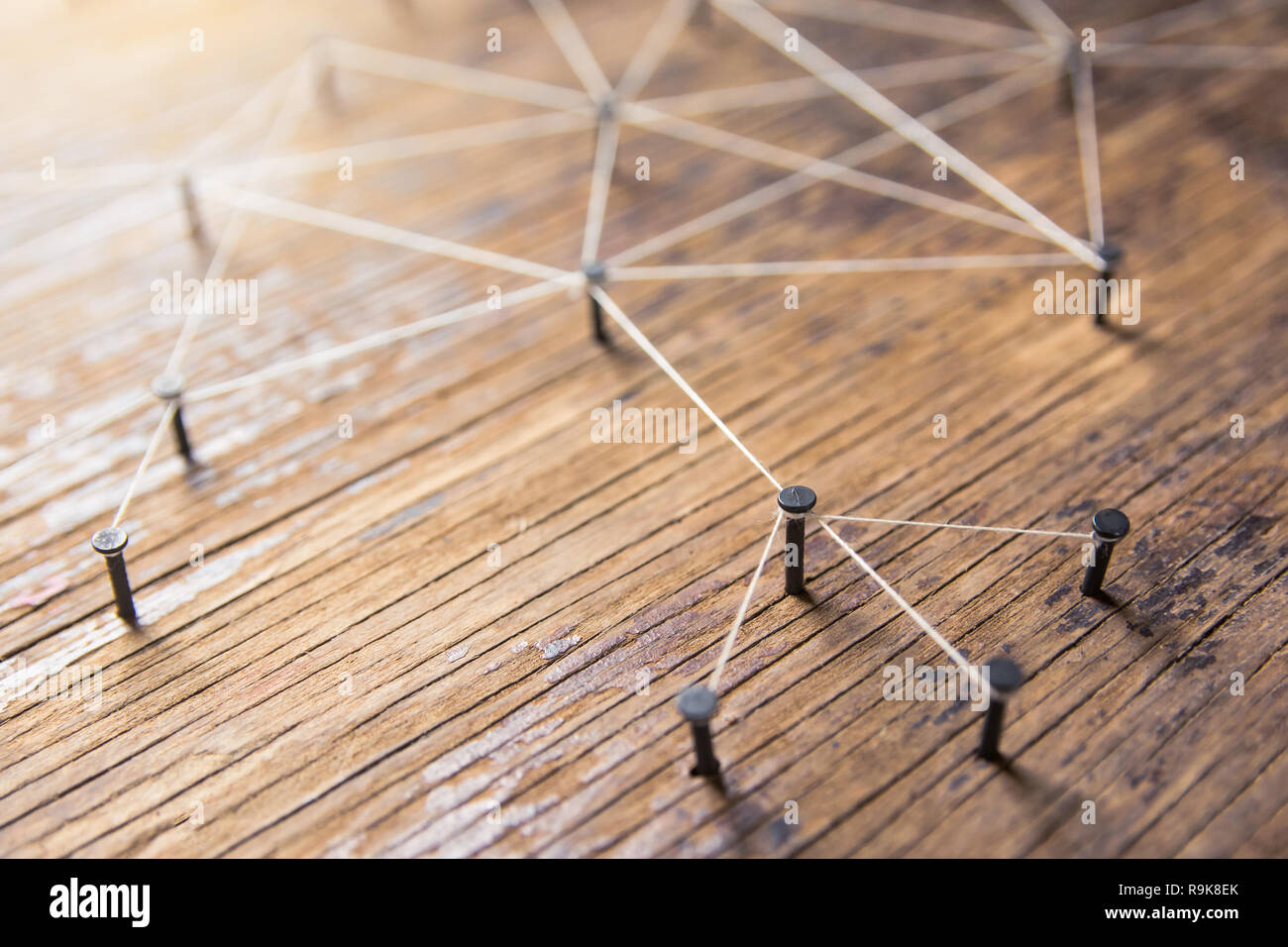 Connecting networks concept - network connected with yarn white on ...