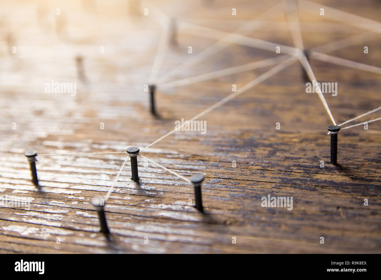 Connecting networks concept - network connected with yarn white on ...