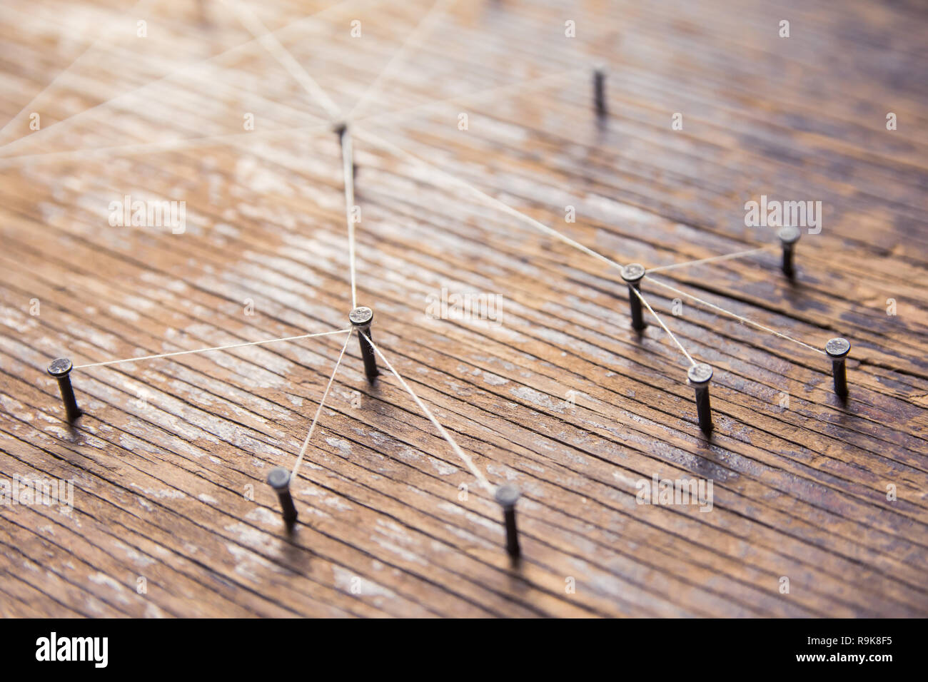 Connecting networks concept - network connected with yarn white on ...