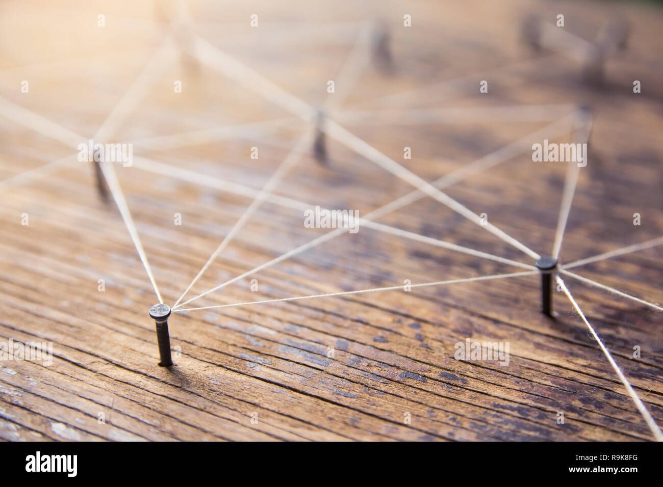 Connecting networks concept - network connected with yarn white on ...