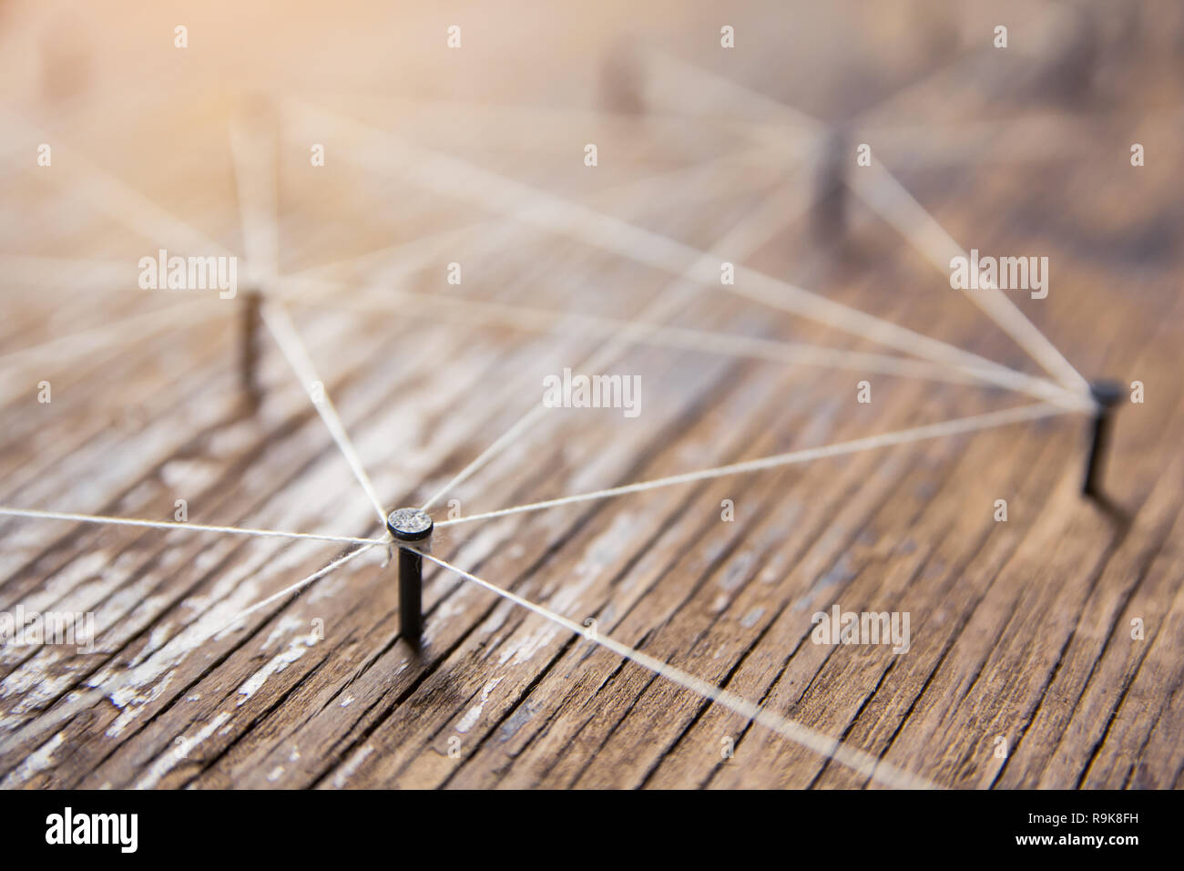 Connecting networks concept - network connected with yarn white on ...