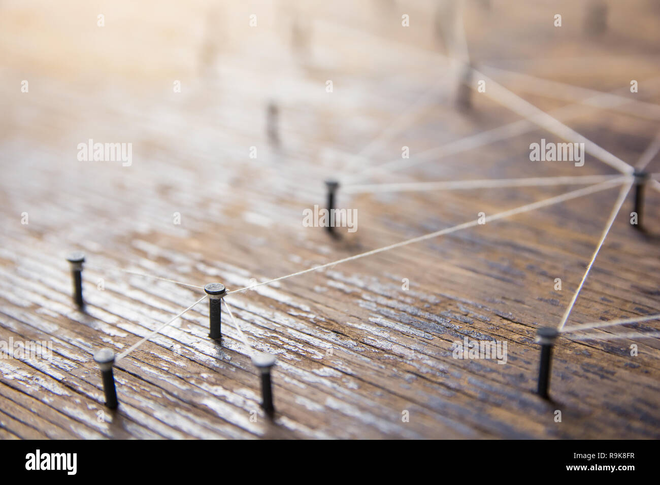 Connecting networks concept - network connected with yarn white on ...