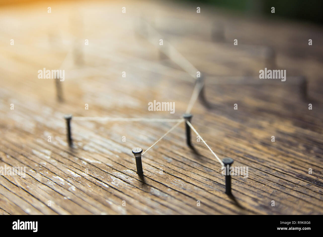 Connecting networks concept - network connected with yarn white on ...