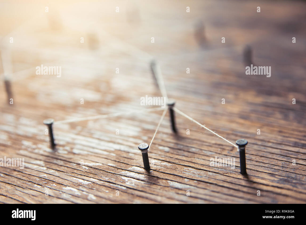 Connecting networks concept - network connected with yarn white on ...