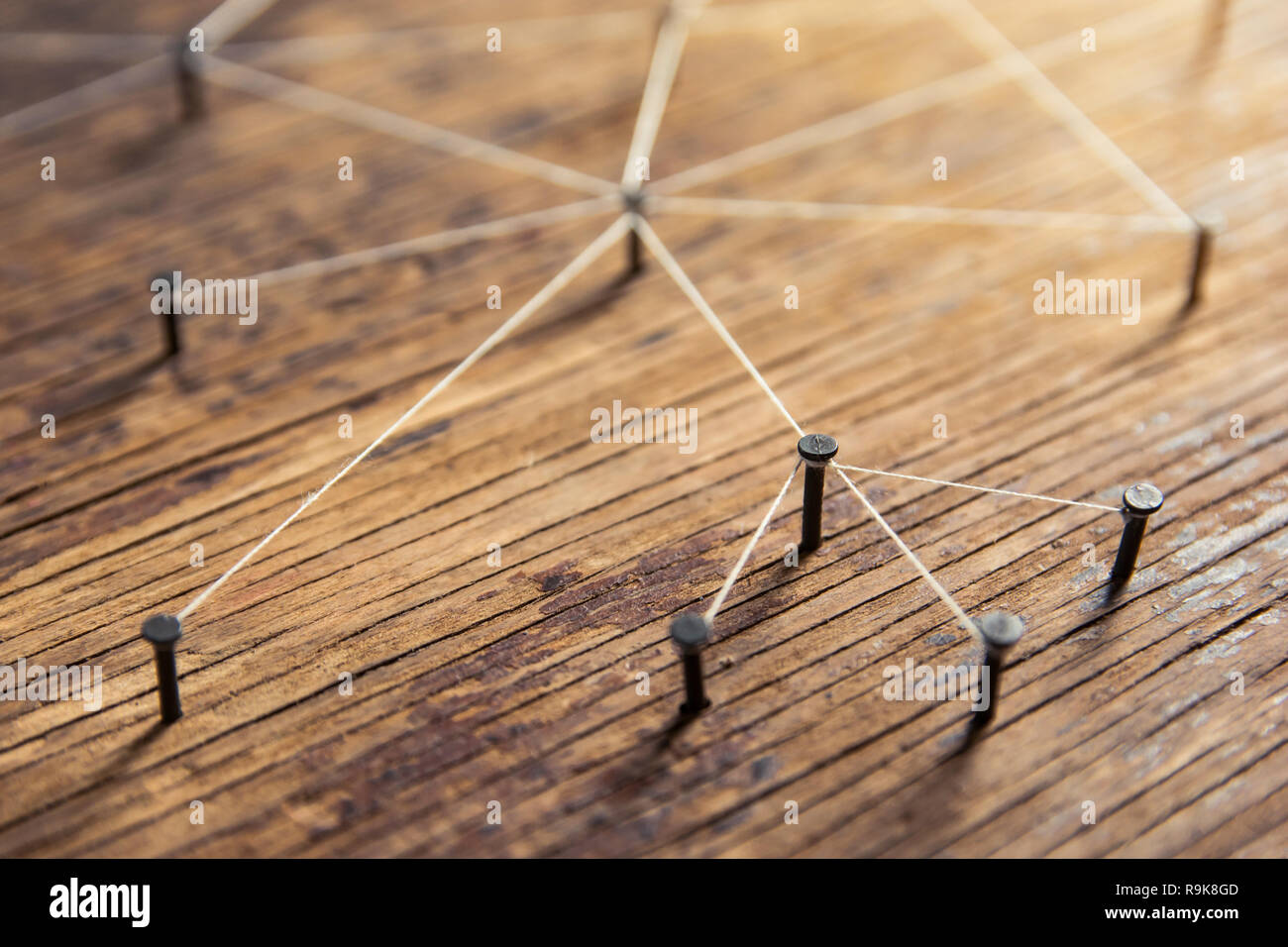 Connecting networks concept - network connected with yarn white on ...