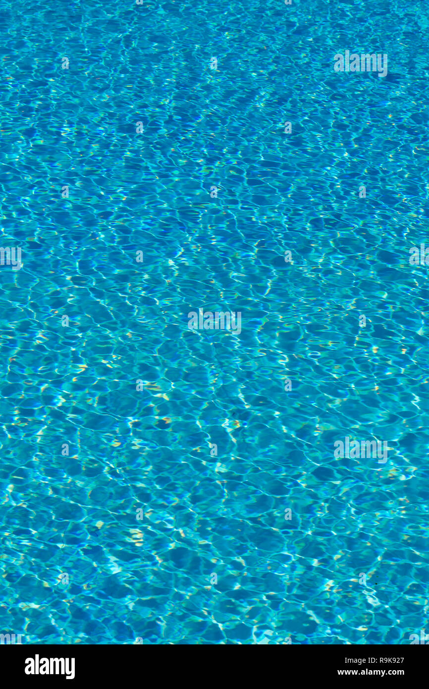 Blue water in swimming pool background. Ripple Water in swimming pool ...