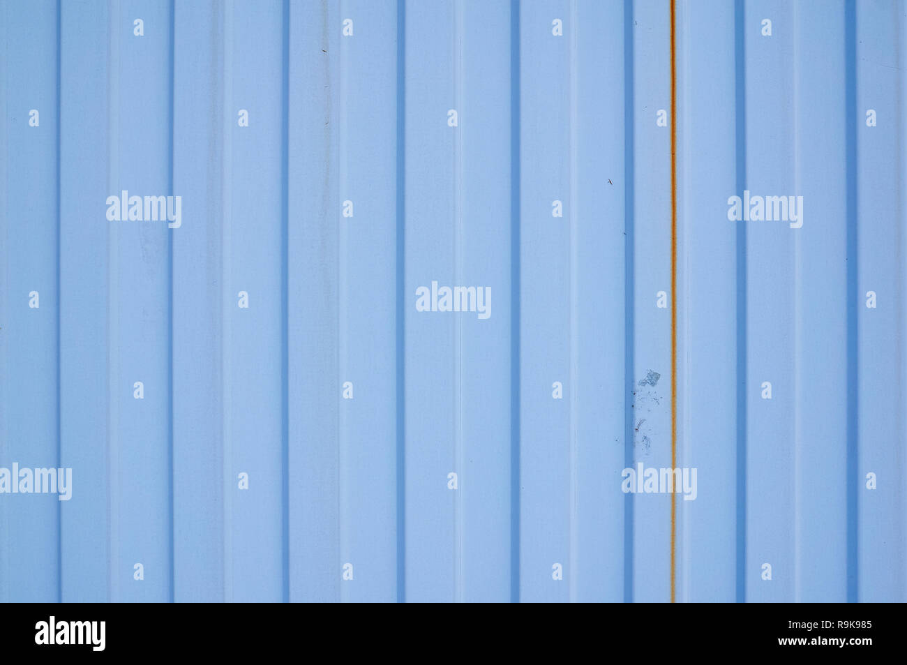 Blue corrugated iron fence hi-res stock photography and images - Alamy