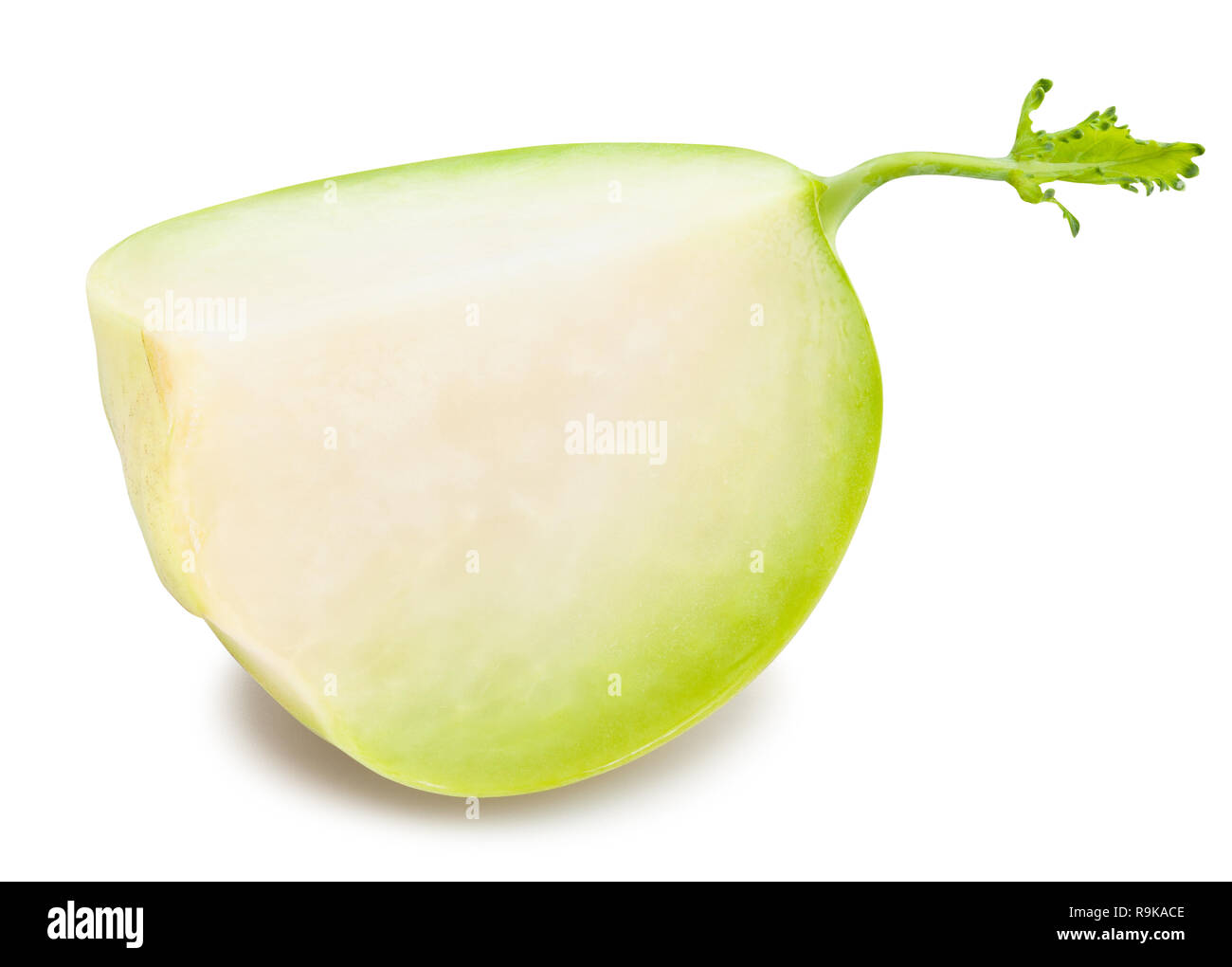 one kohlrabi cut into slices and white background Stock Photo - Alamy