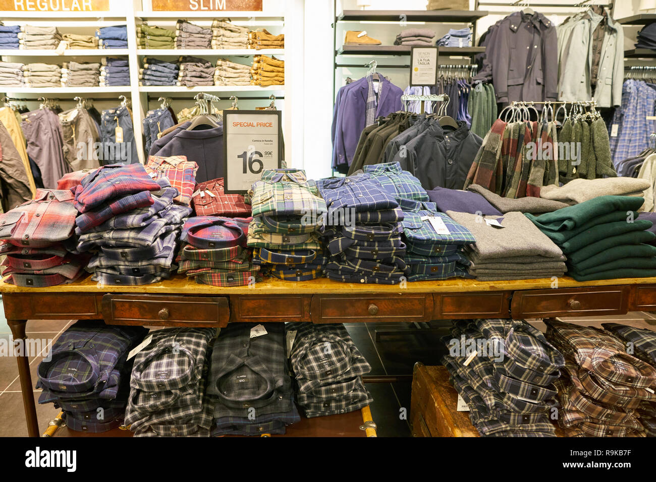 MILAN, ITALY - CIRCA NOVEMBER, 2017: clothing on display at retail ...