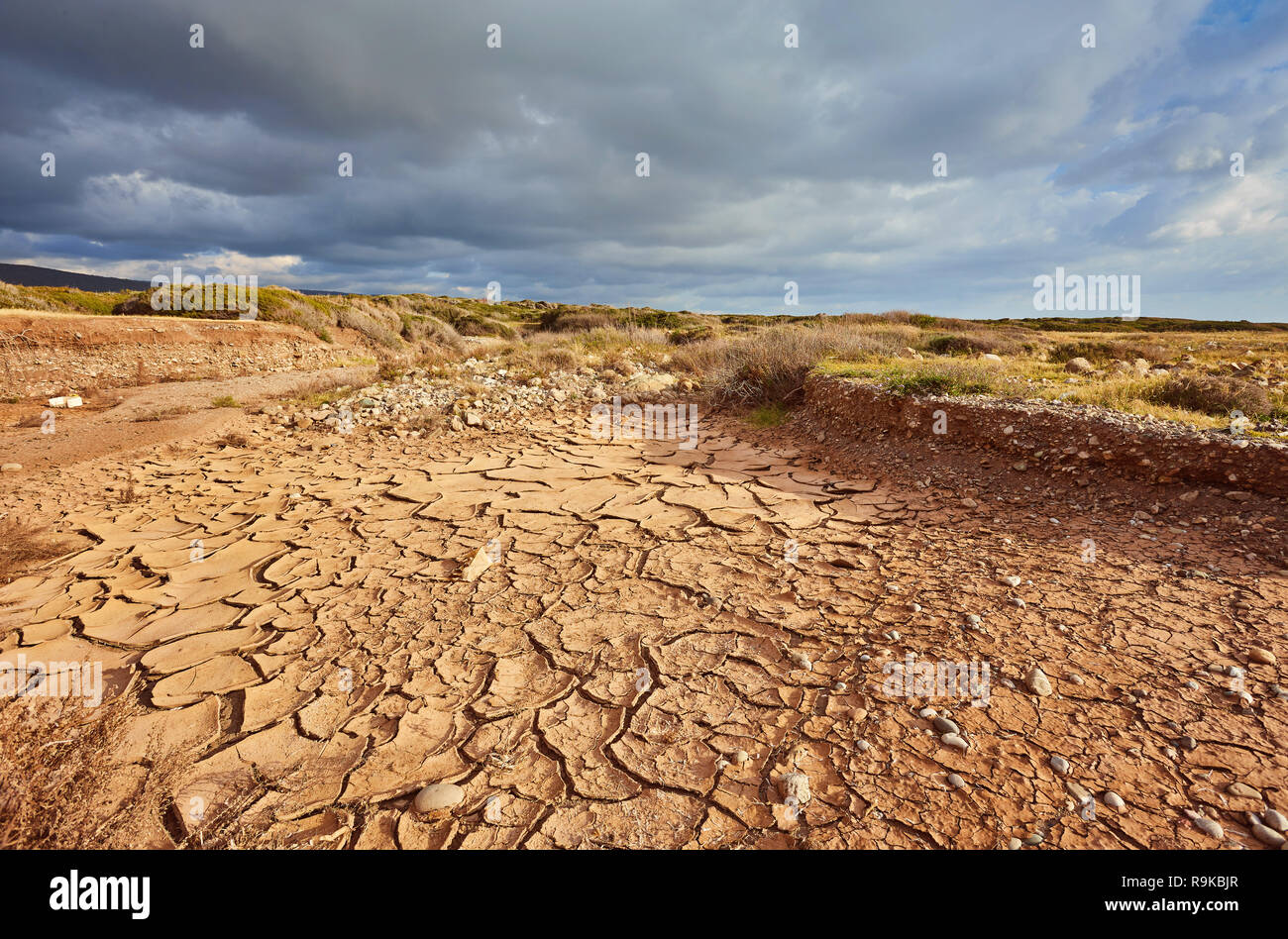 global warming. deep blue sky with clouds over drought earth Stock ...