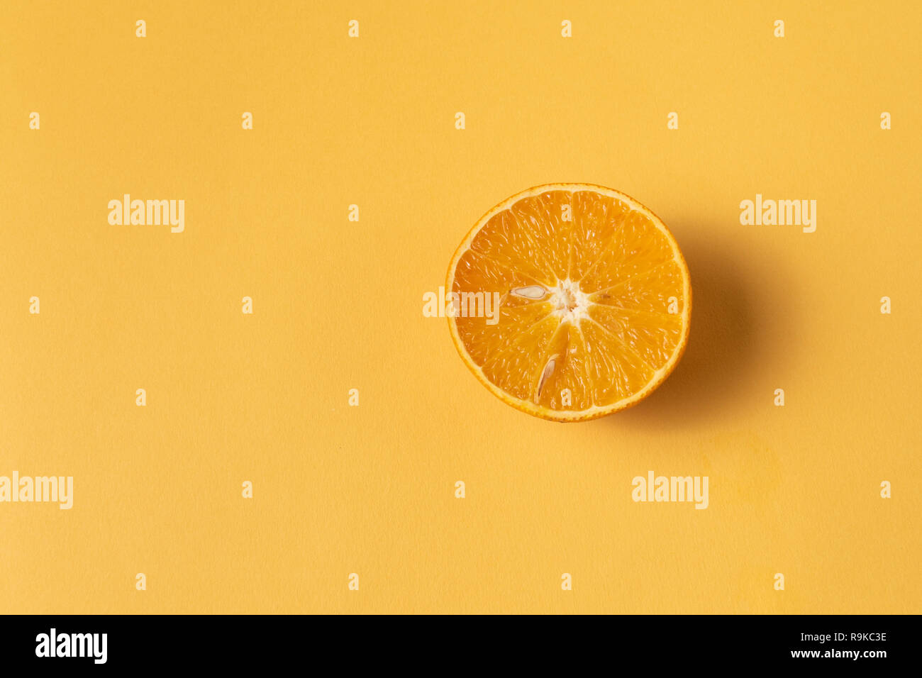 Flat lay view Orange juicy ripe mandarin or tangerine fruit , cut in ...