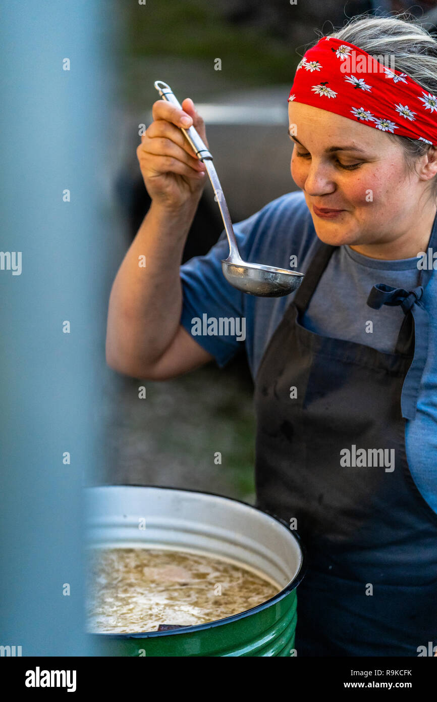 Female Chef Tasting Soup - Kitchen Set Stock Photo - Alamy
