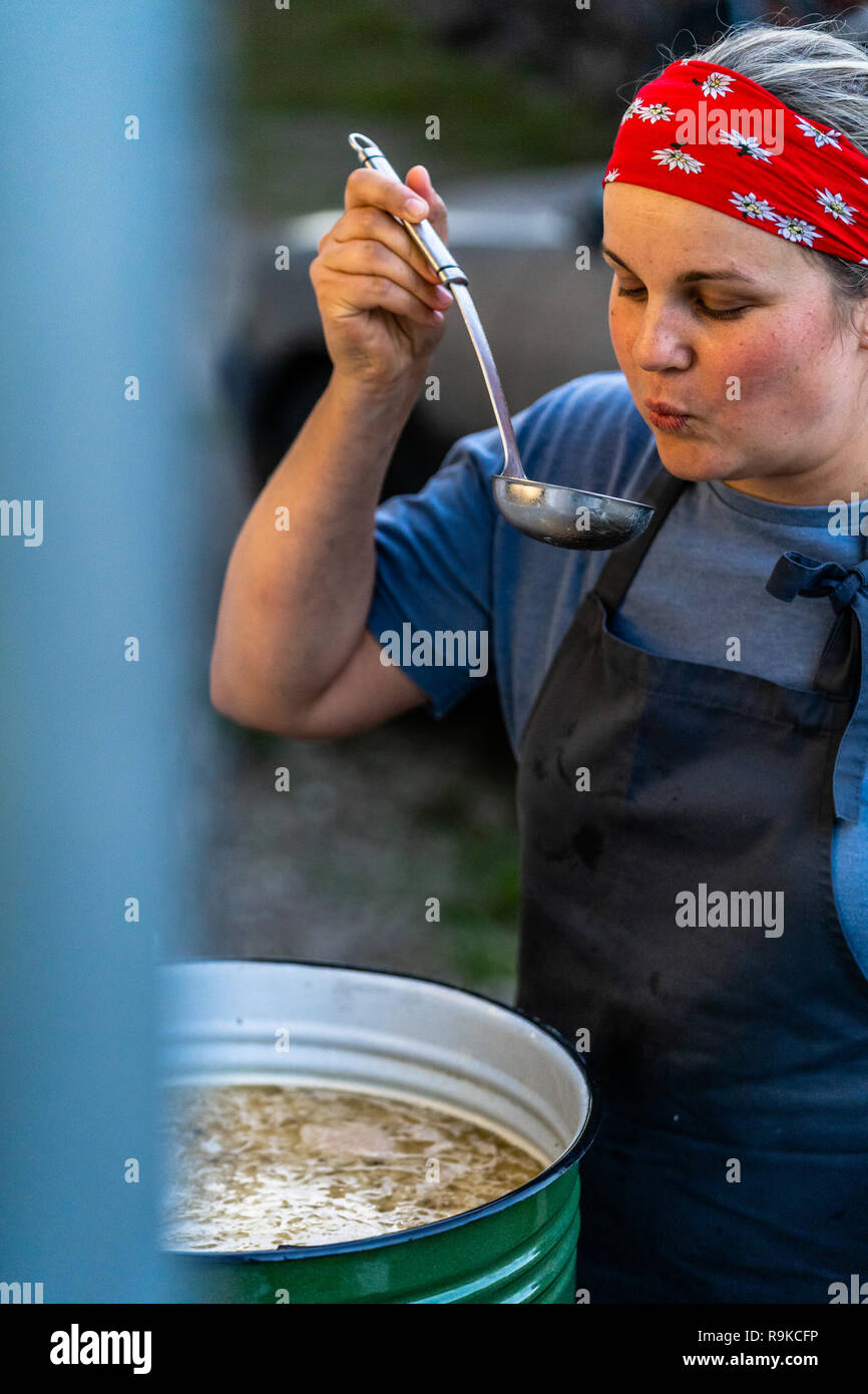 Female Chef Tasting Soup - Kitchen Set Stock Photo - Alamy