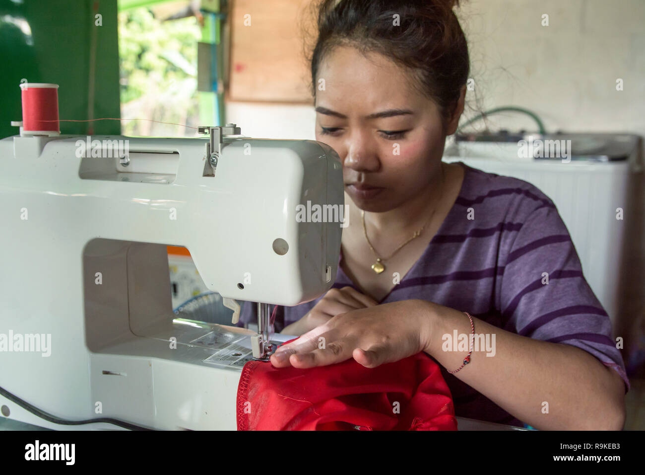 Seamstress seamstresses textile textiles hi-res stock photography and ...