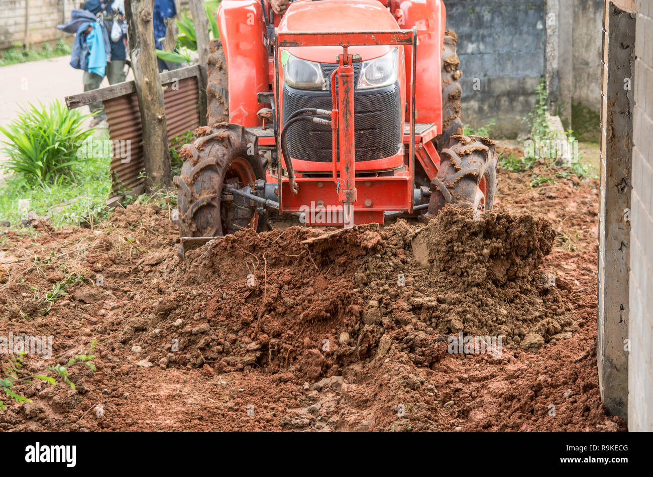 Tractor grader soil working on gravel leveling for Stock Photo - Alamy