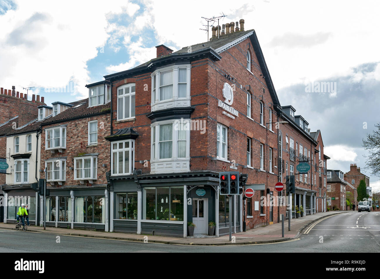 York, England - April 2018: Old brick buildings at street corner on ...