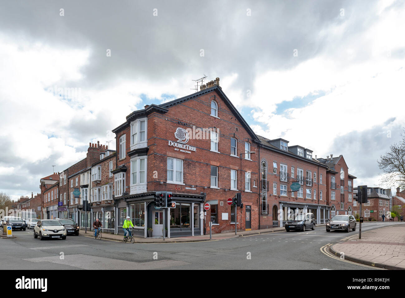 York, England - April 2018: Old brick buildings at street corner on ...
