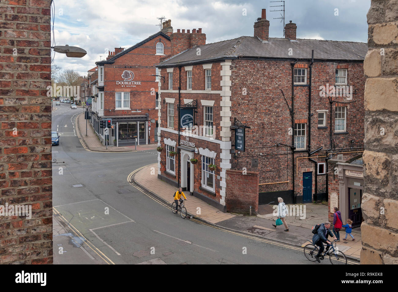 York, England - April 2018: Old brick buildings at street corner on ...