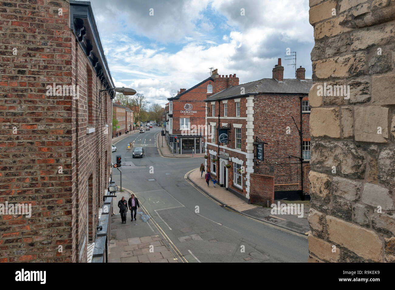 York, England - April 2018: Old brick buildings at street corner on ...