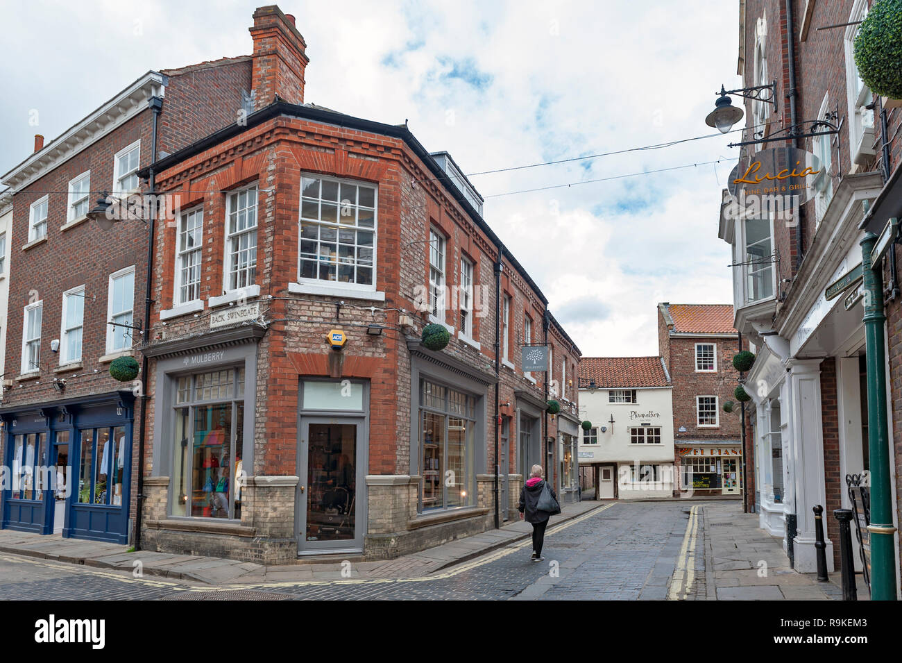 York, England - April 2018: Old brick building at corner of Swinegate ...
