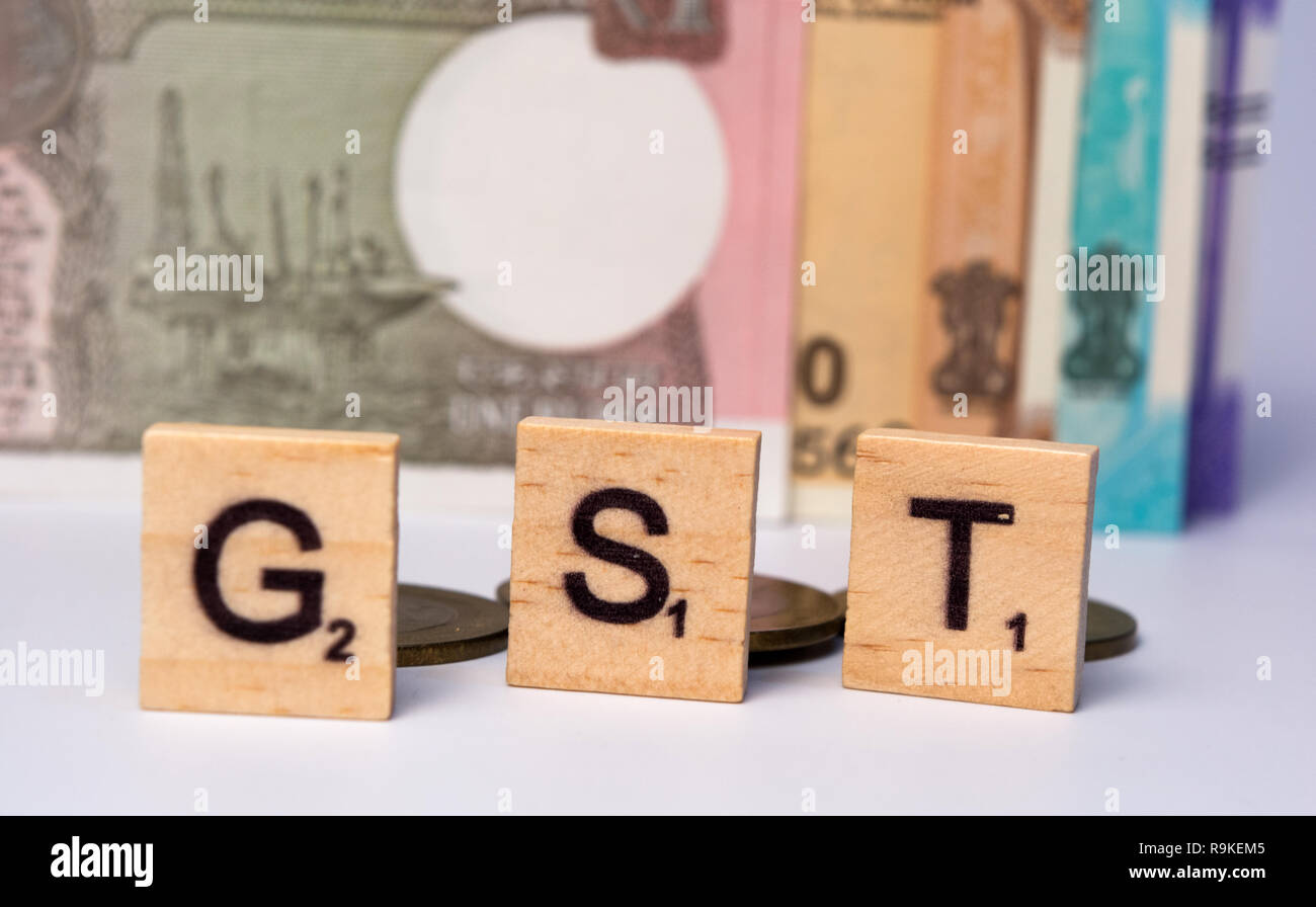 Concept of GST with indian currency on isolated background Stock Photo ...