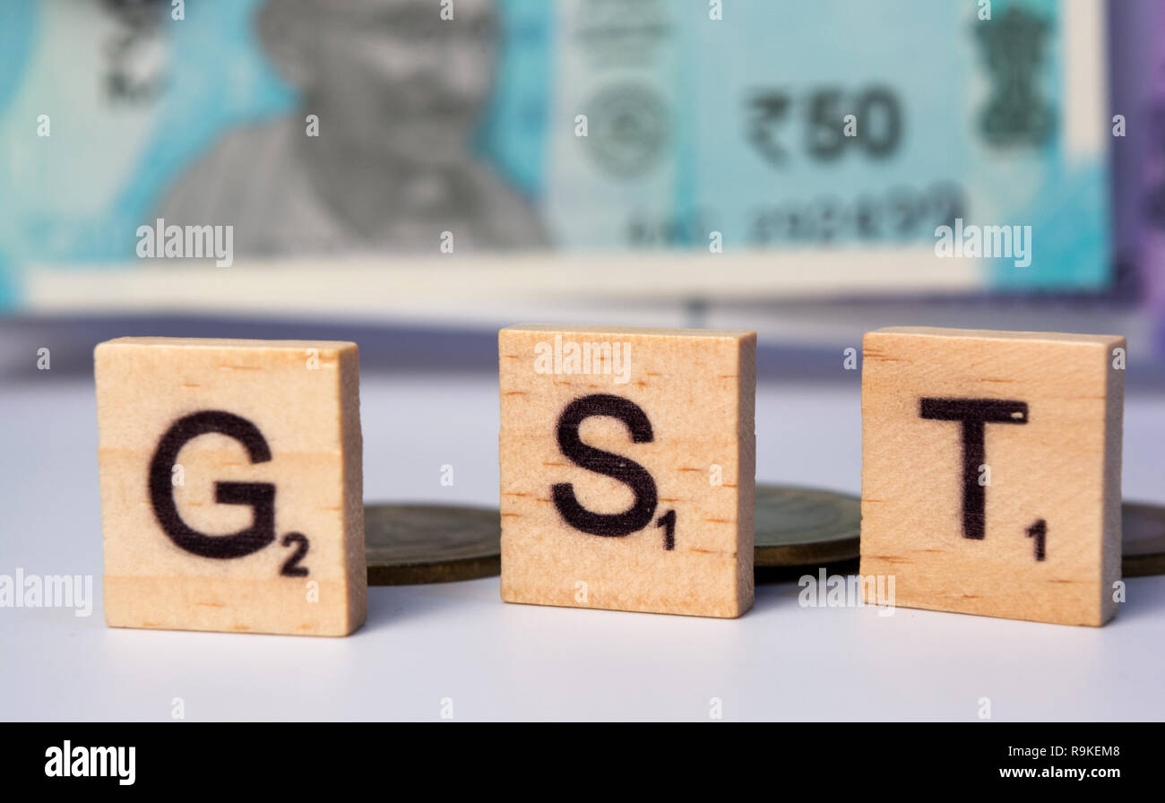 Concept of GST with indian currency on isolated background Stock Photo ...