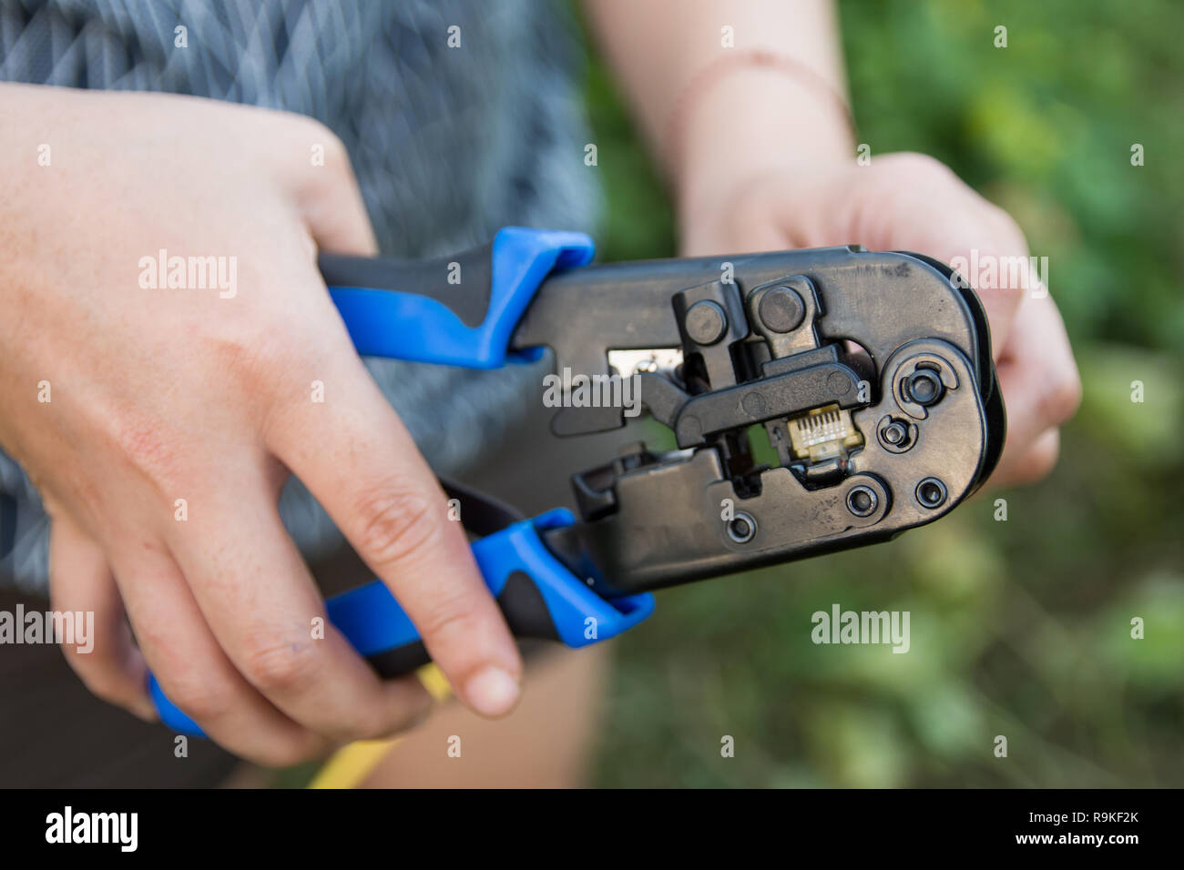 Assembly LAN cable to RJ45 with lan cable clamp Stock Photo - Alamy