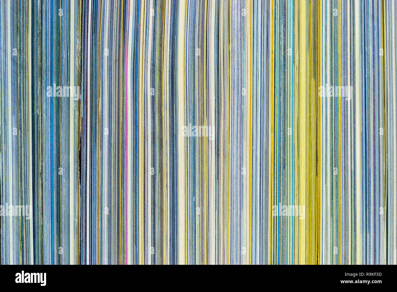 Background surface of colorful magazines stack side view Stock Photo ...