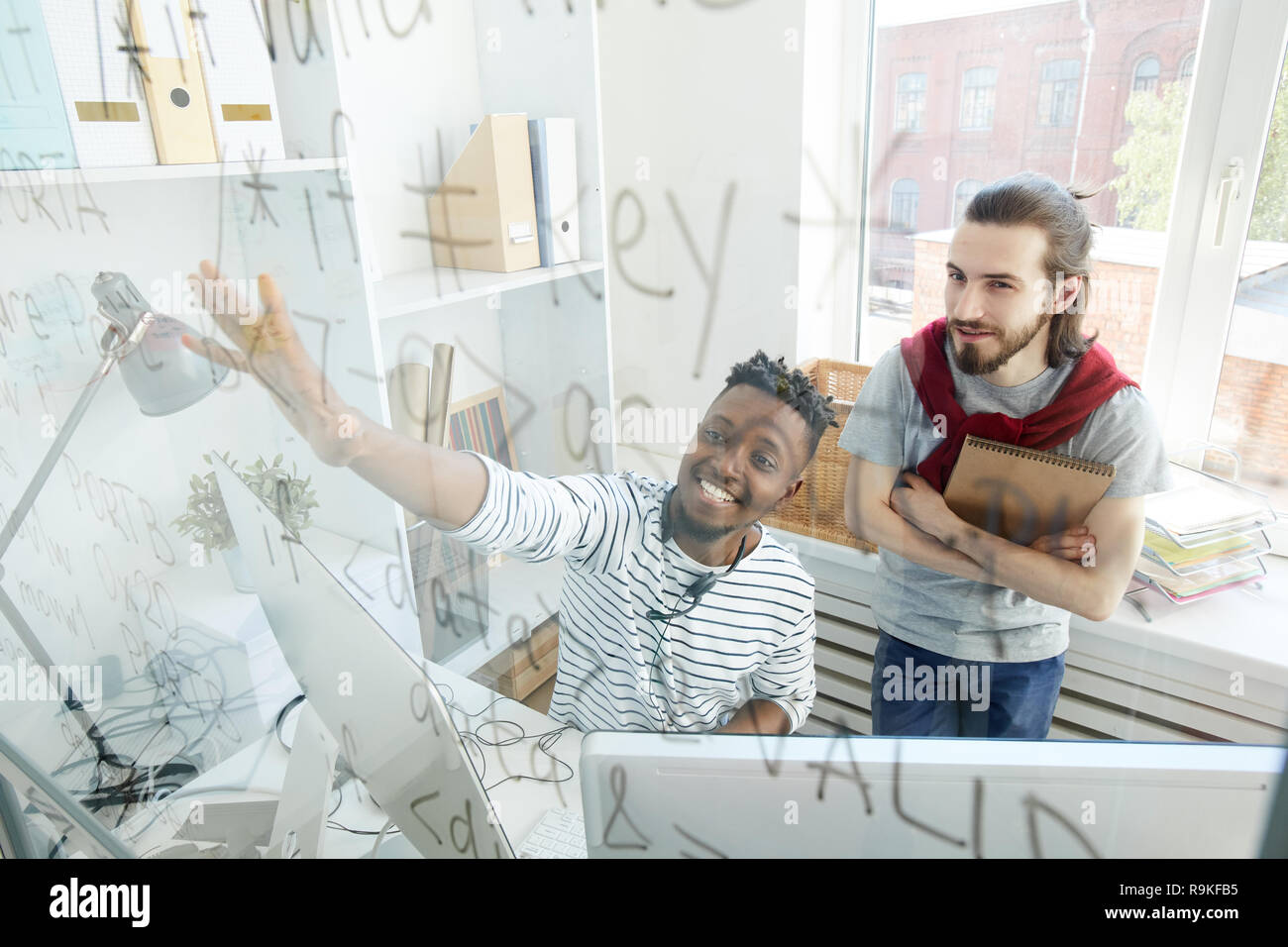 Discussing technical points Stock Photo - Alamy
