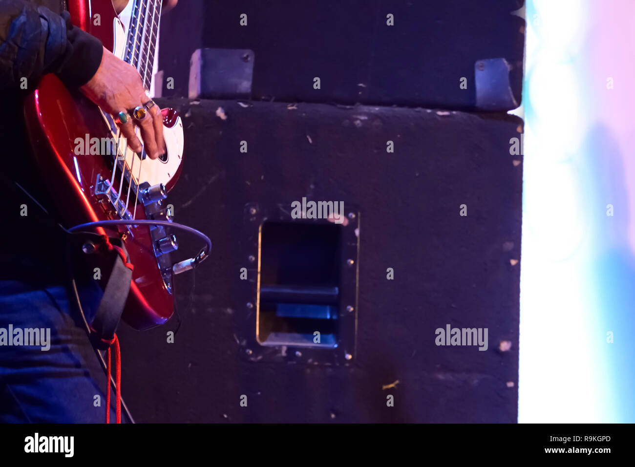 Close-up of artist playing guitar in live concert on stage Stock Photo ...