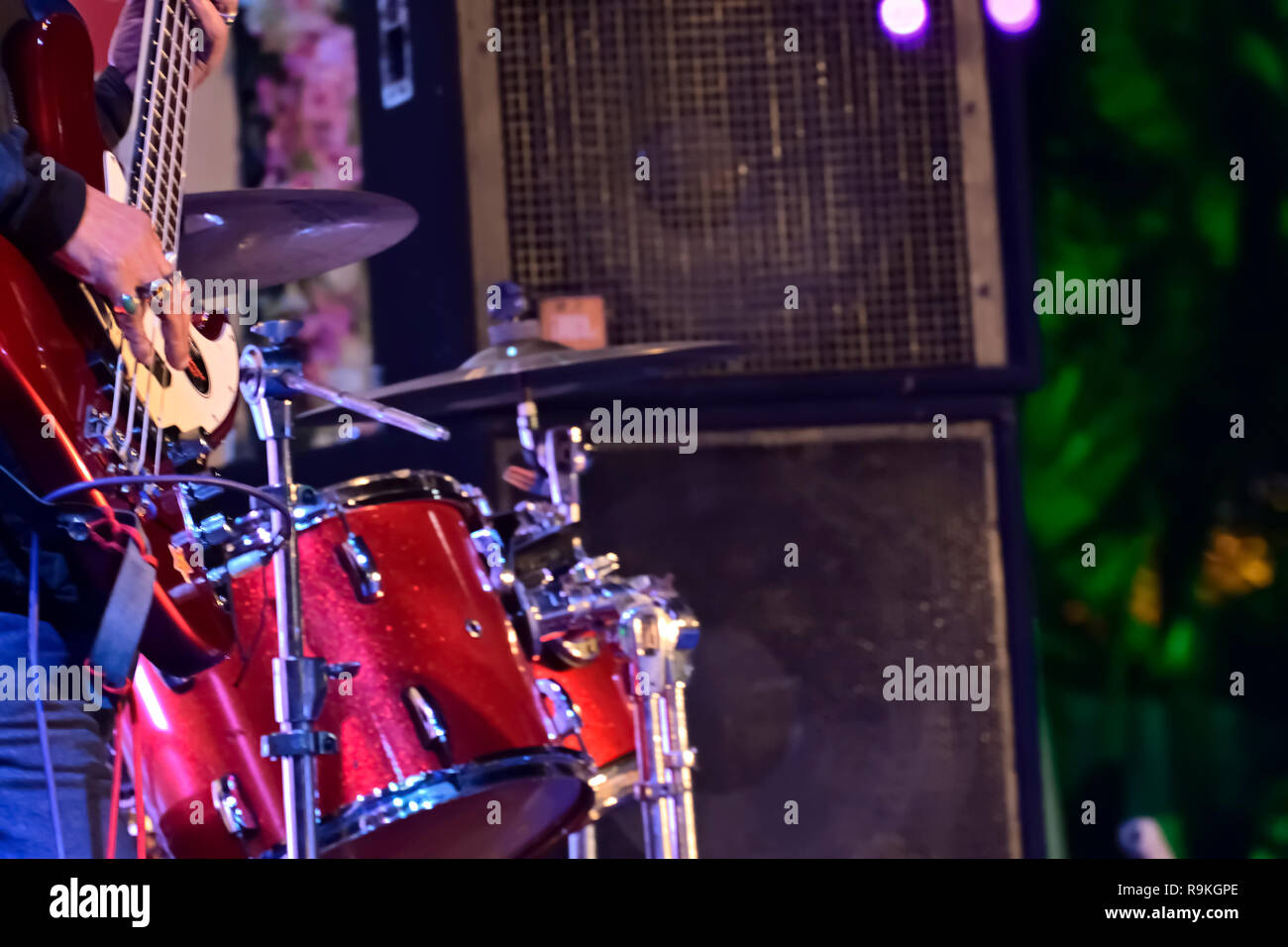 Close-up of artist playing guitar in live concert on stage Stock Photo ...