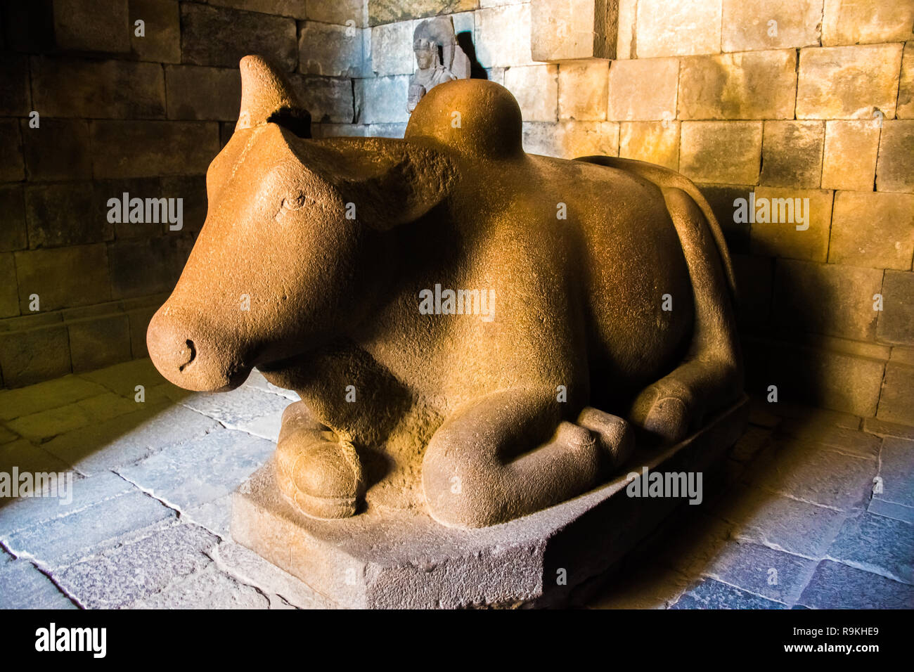 Cow statue in Ancient mystical old Hindu Prambanan temple near ...