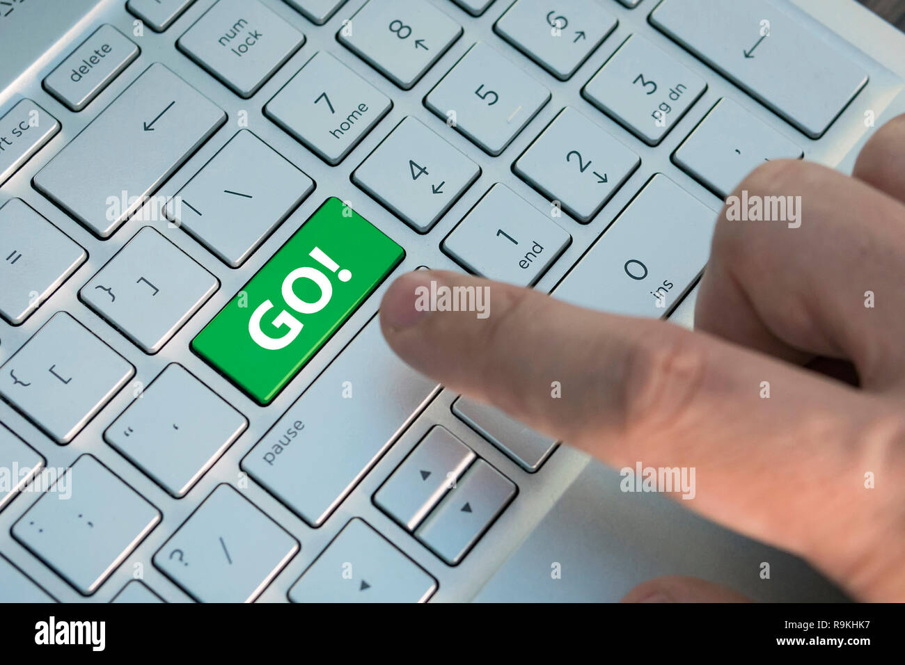 concept of Modern Keyboard. Metallic Keyboard with the words GO Stock ...