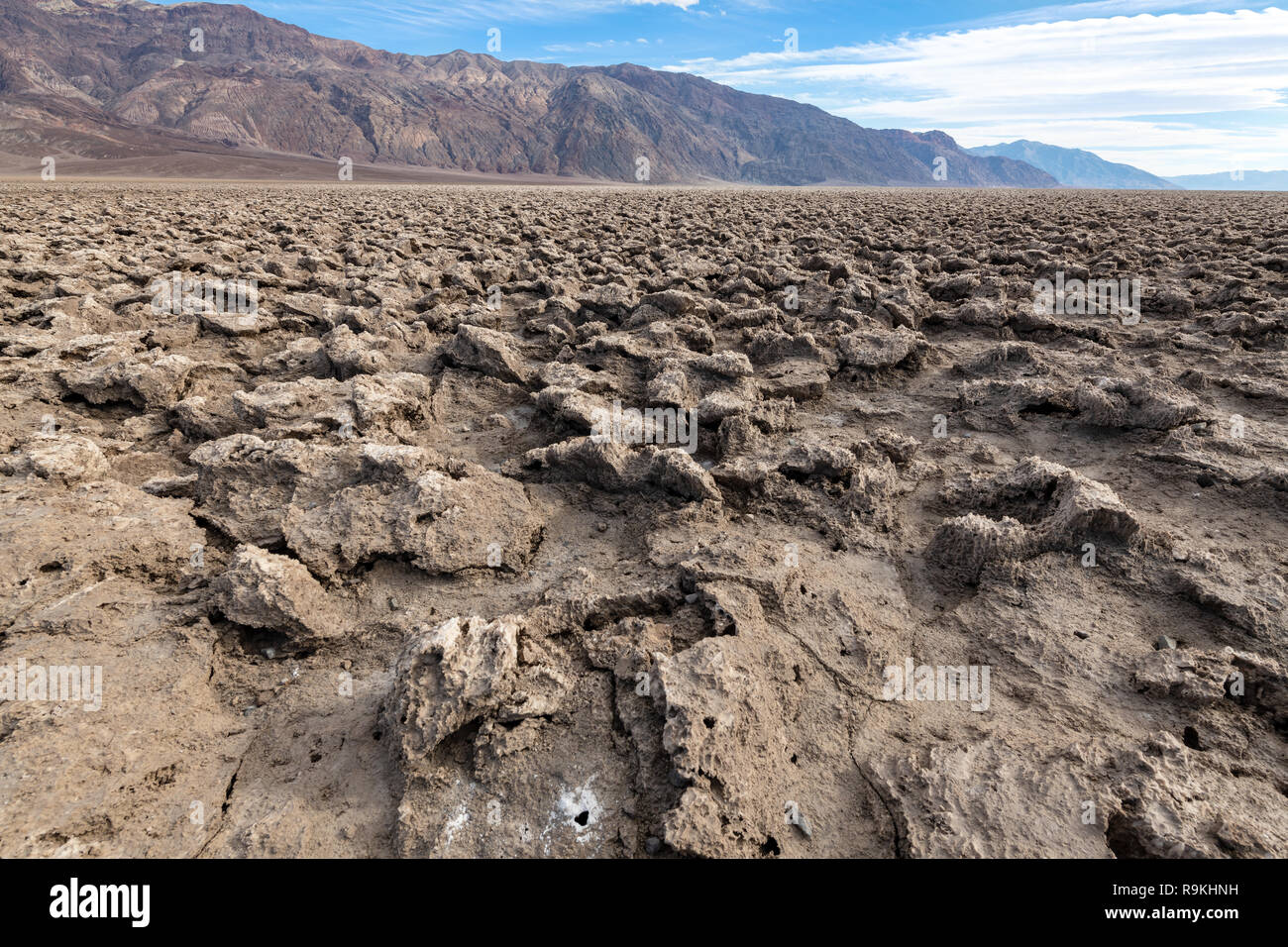 The Devil's Golf Course salt formations and mountains in Death Valley ...