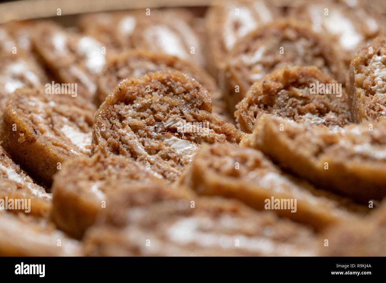 Christmas yule log, buckwheat dough and cream filling, selective focus ...