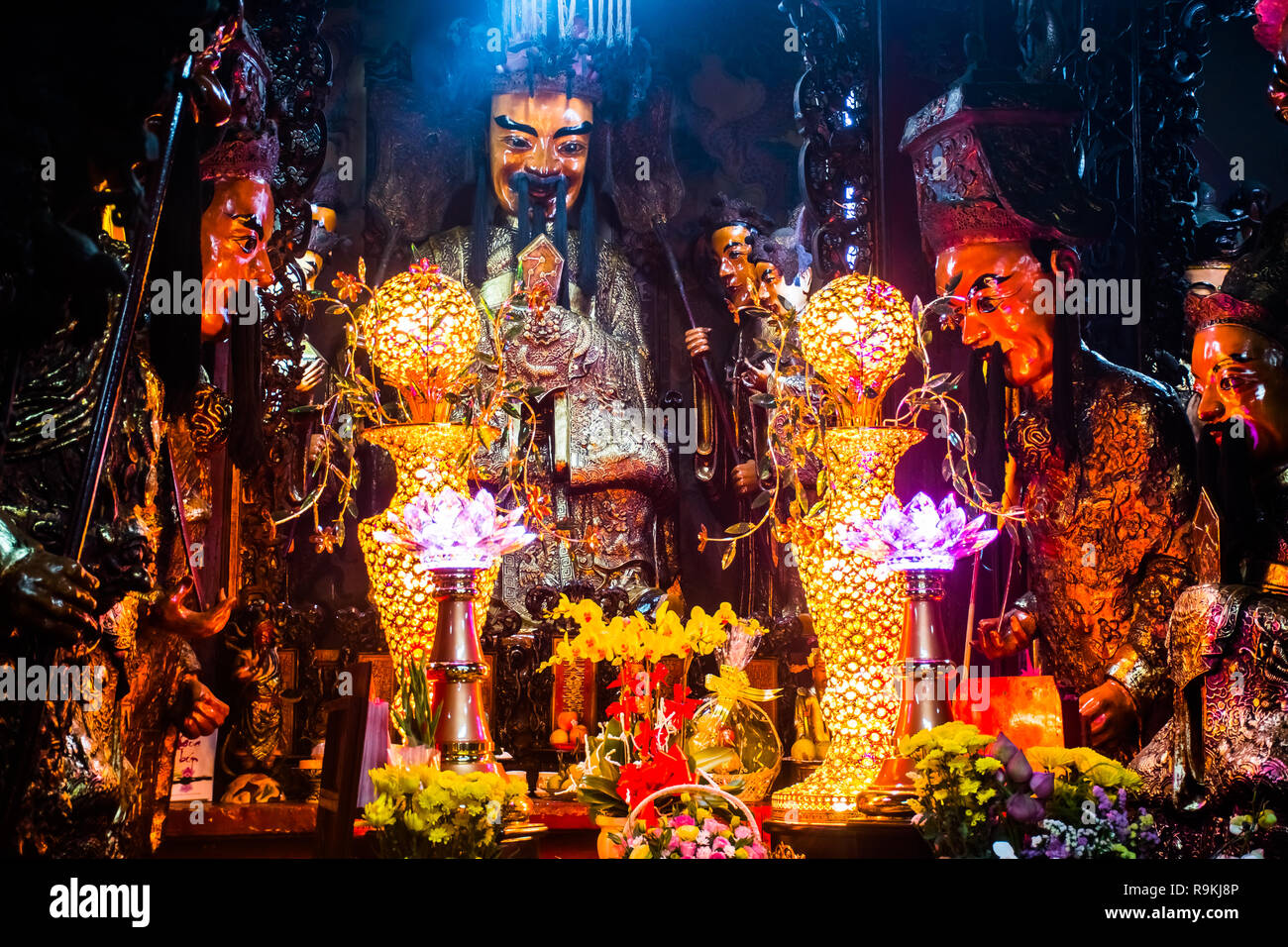 Statues with candles at mysterious Jade Emperor Pagoda, Ho Chi Minh ...