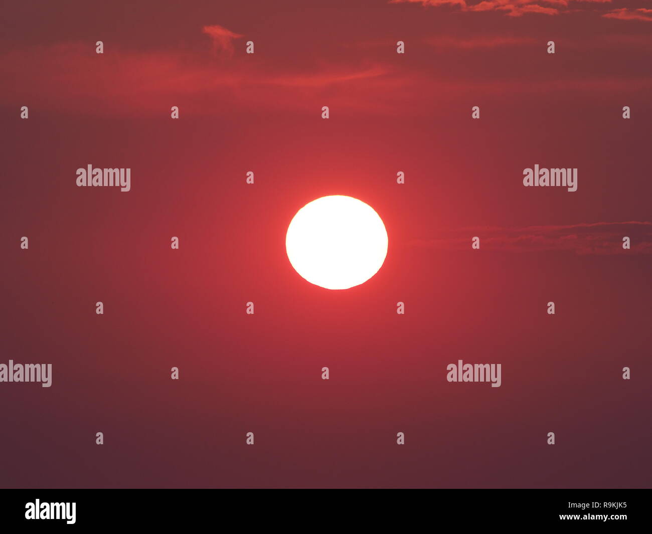 Marvelous sun set with clouds formation seen from european city of ...