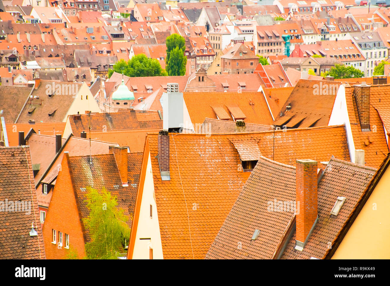 Cityscape of Nuremberg with red roofs and church in Germany Stock Photo ...