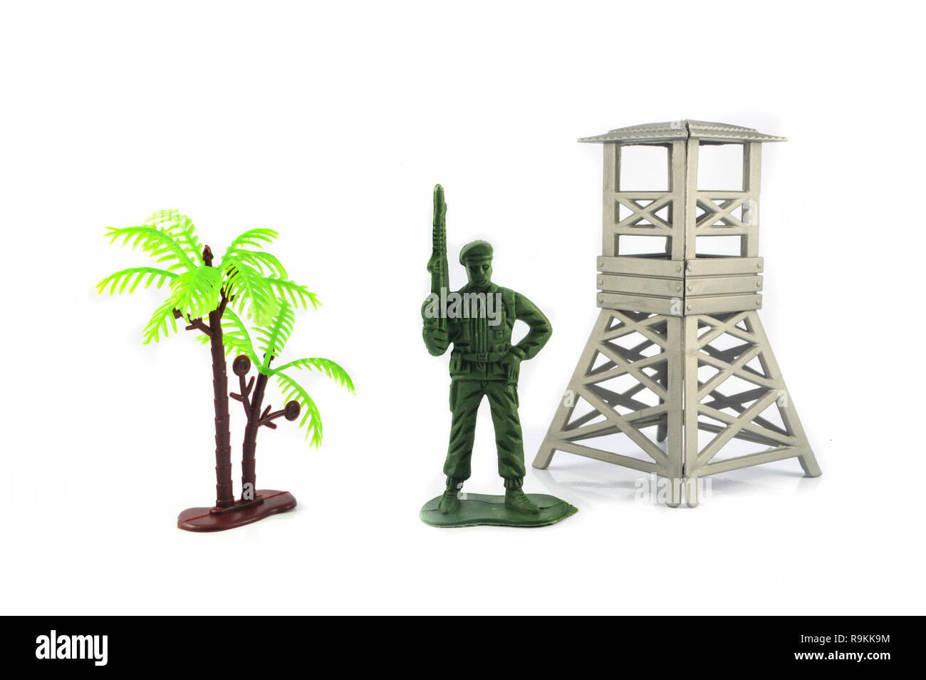 Toy soldier isolated on white background / Green miniature toy soldier ...