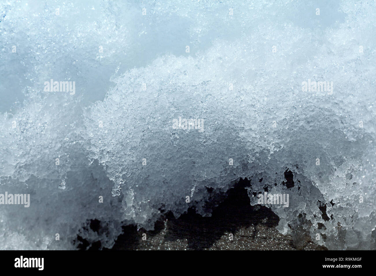 Closeup white snow detail structure background Stock Photo - Alamy