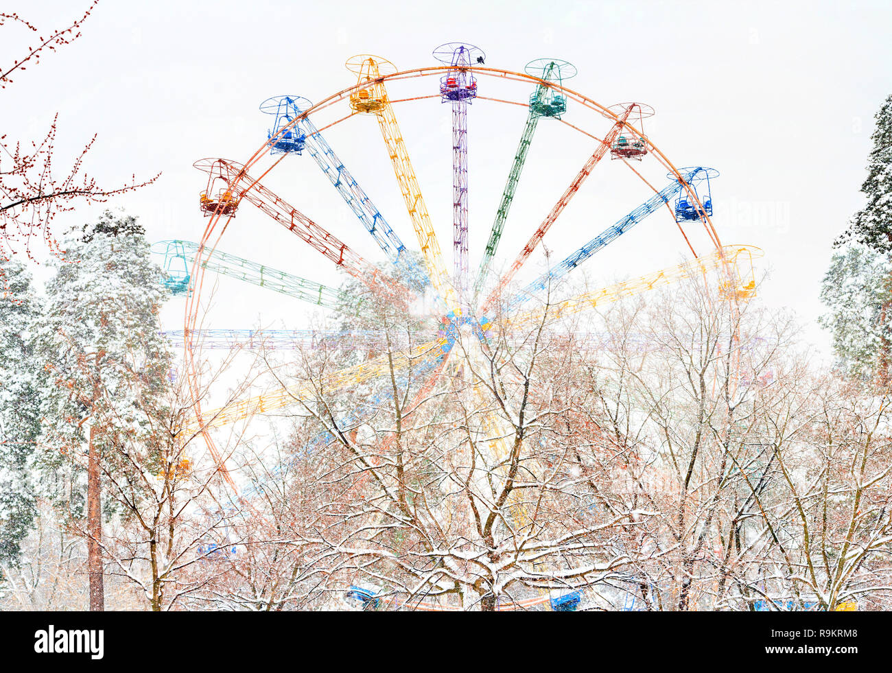 ferris wheel in a snowy forest, wildlife, first spring days Stock Photo ...