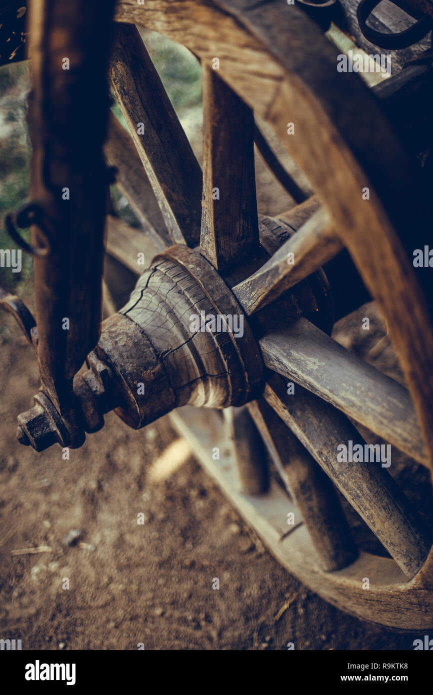 Color image of a old wooden cart wheel Stock Photo - Alamy