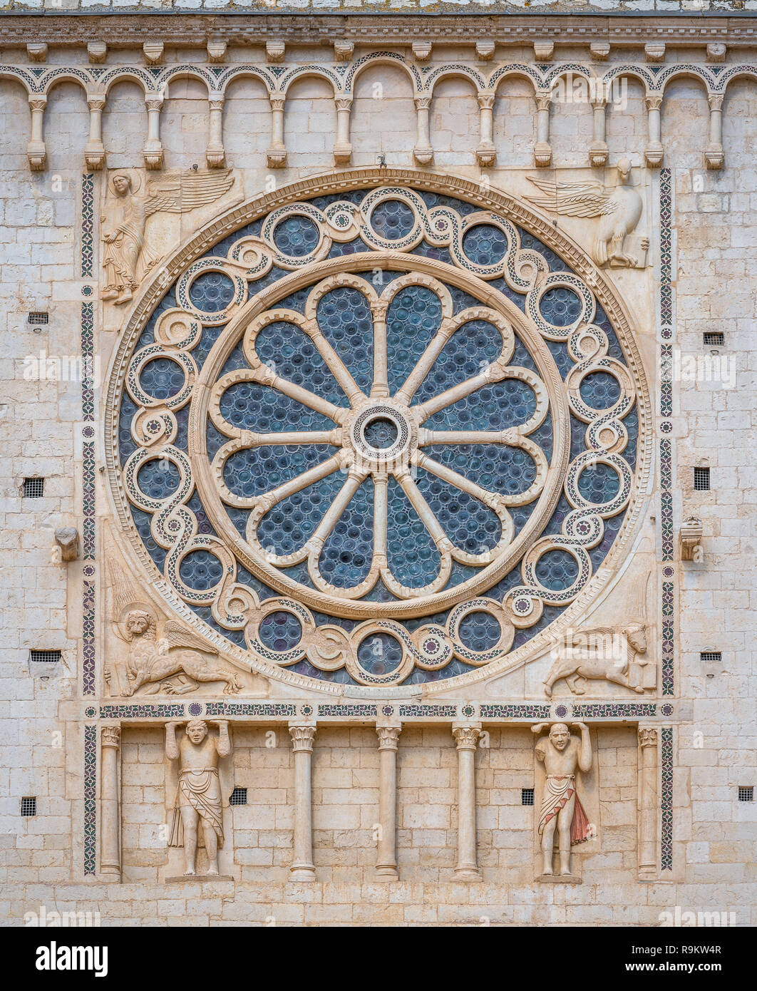 Rose window from the facade of the Duomo of Spoleto. Umbria, central ...