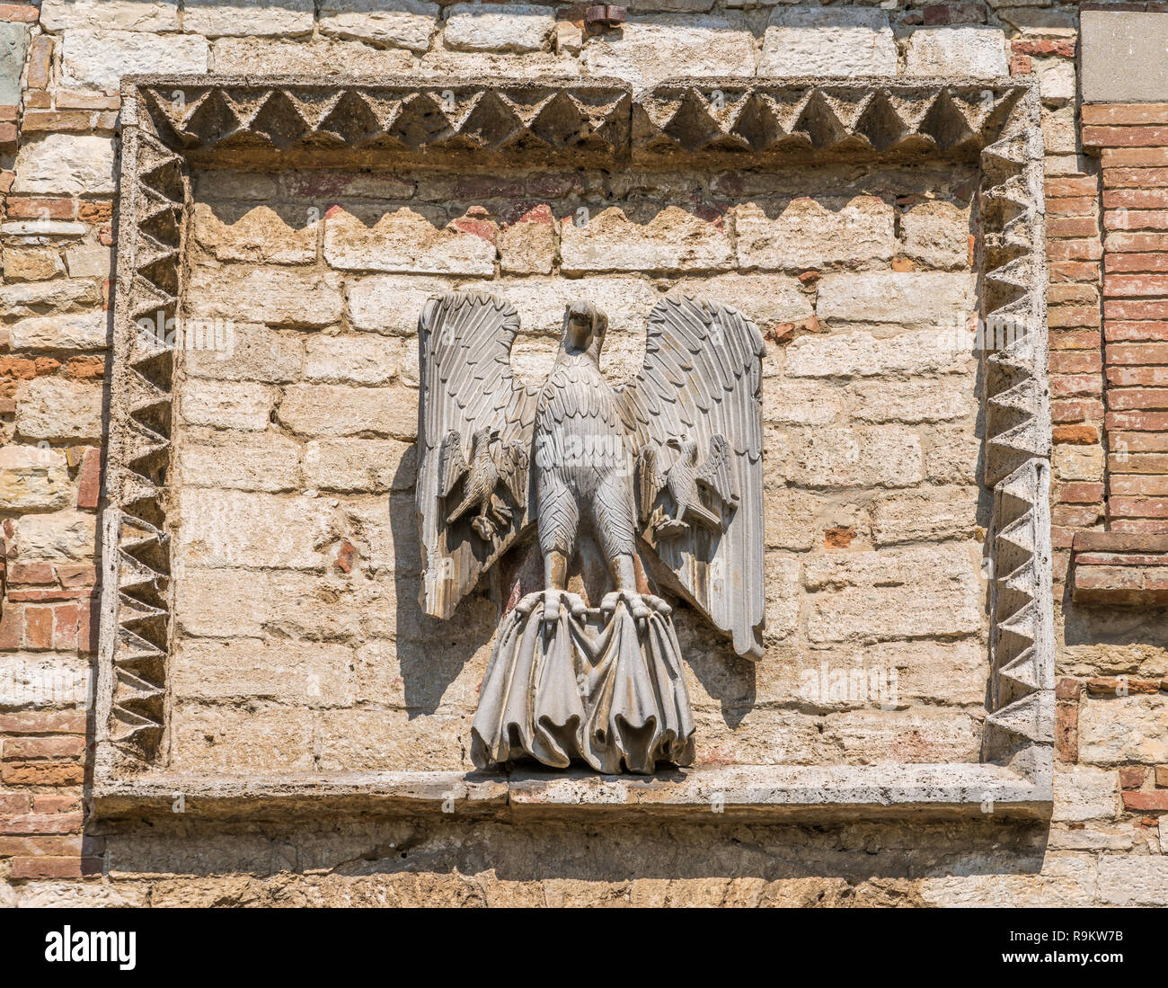 Eagle symbol on the Porta della Catena in Todi, Province of Perugia ...