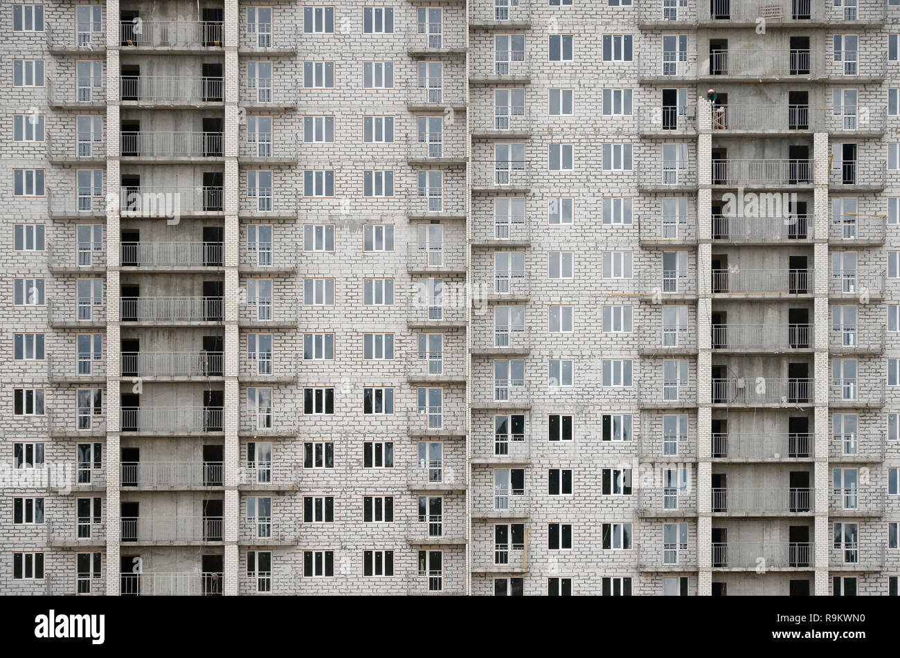 Textured pattern of a russian whitestone residential house building ...